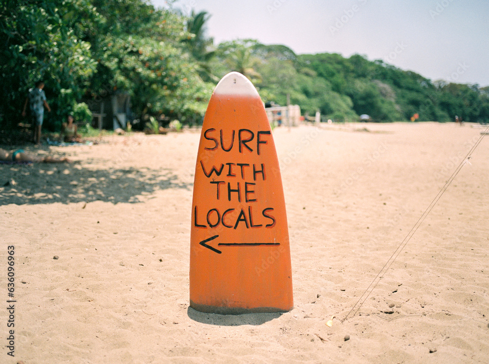 Surf board sign to advertise a surf class / lessons Stock Photo | Adobe ...