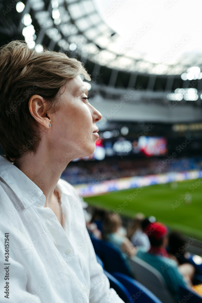 Female spectator at sports stadium. Stock Photo | Adobe Stock