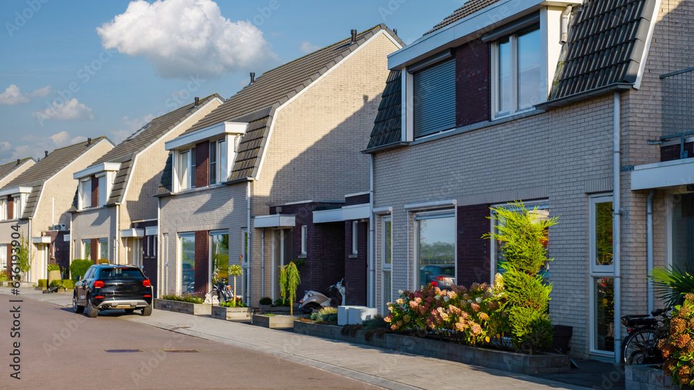 Dutch Suburban area with modern family houses, modern brick houses in a ...
