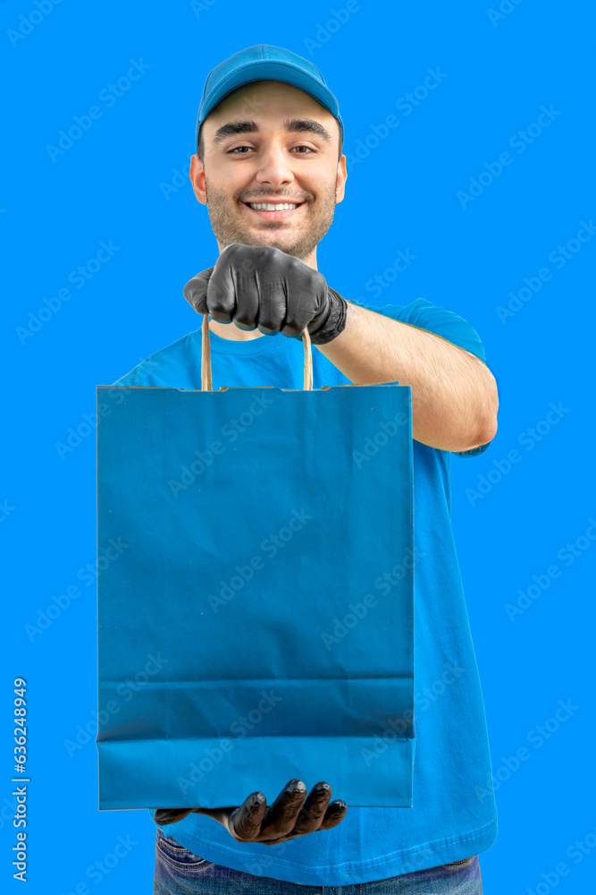 Delivery man with paper bag. Courier in uniform cap and t-shirt, gloves ...