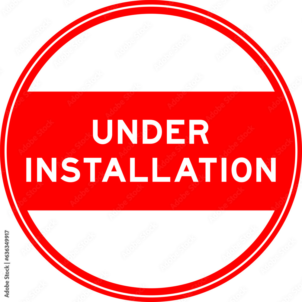 Red color round seal sticker in word under installation on white ...