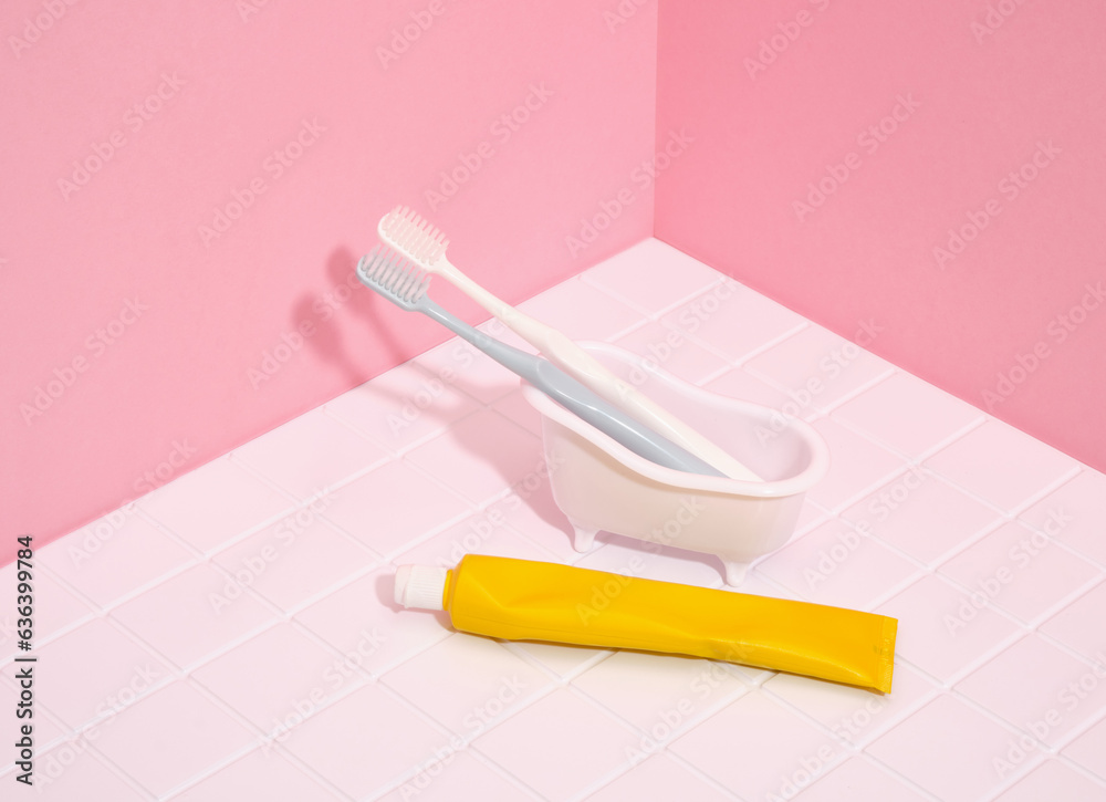 Personal hygiene and toothbrushes. A yellow tube of refreshing ...