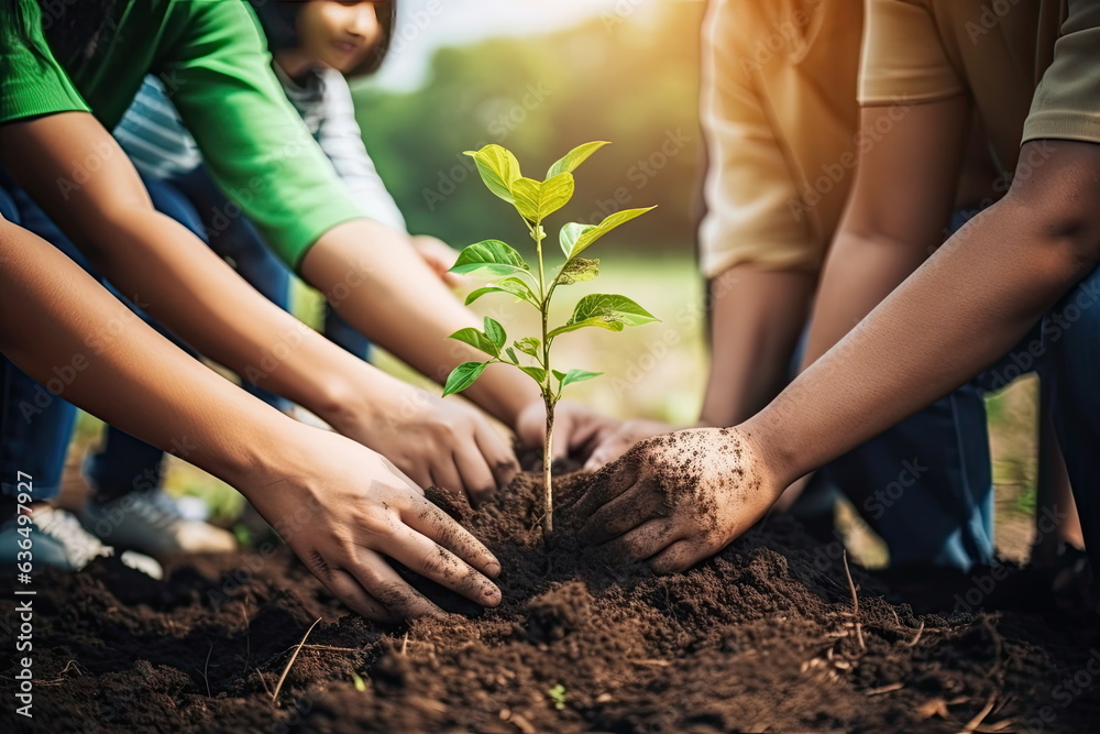 Group of volunteers joins hands together for plant a tree, World ...