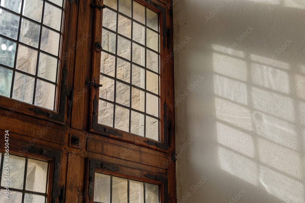 Selective focus and interior view, light pass through old wooden window ...