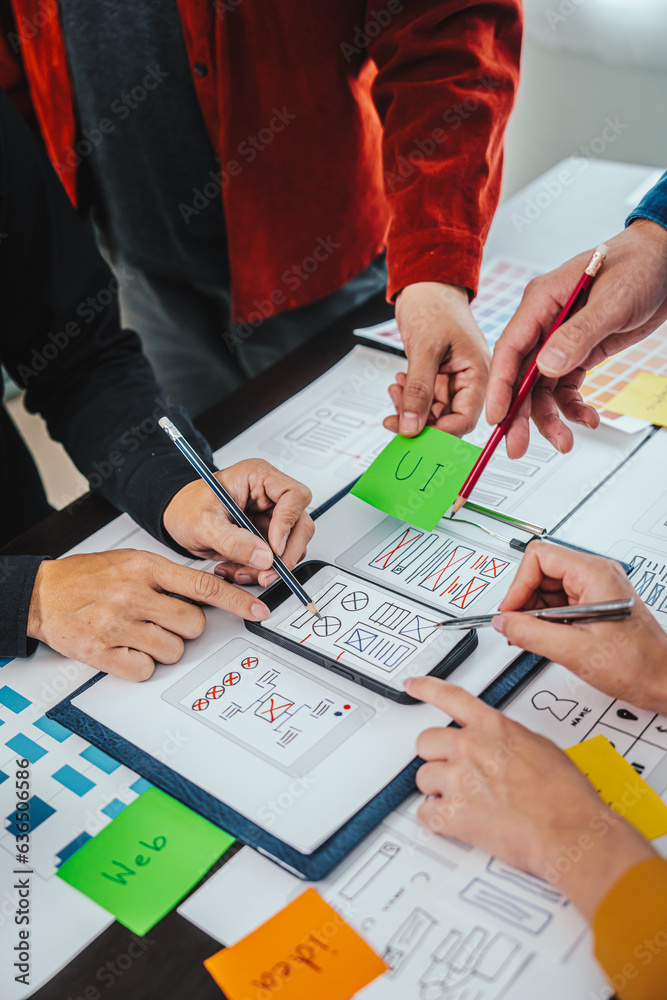 Foto de UI, UX designers developers Group team meeting often fill ...