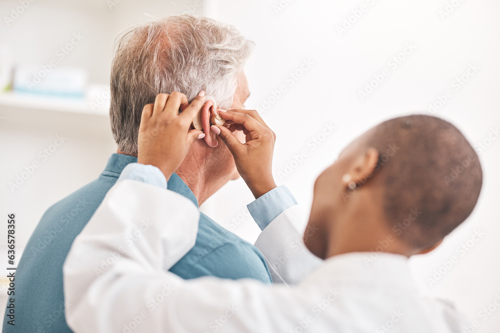 Doctor, helping and man with hearing aid, technology or healthcare or ...
