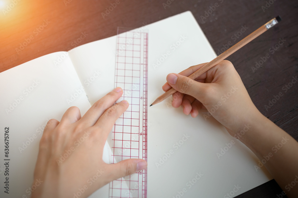 Hands writing blank page working on homework assignment thinking and ...