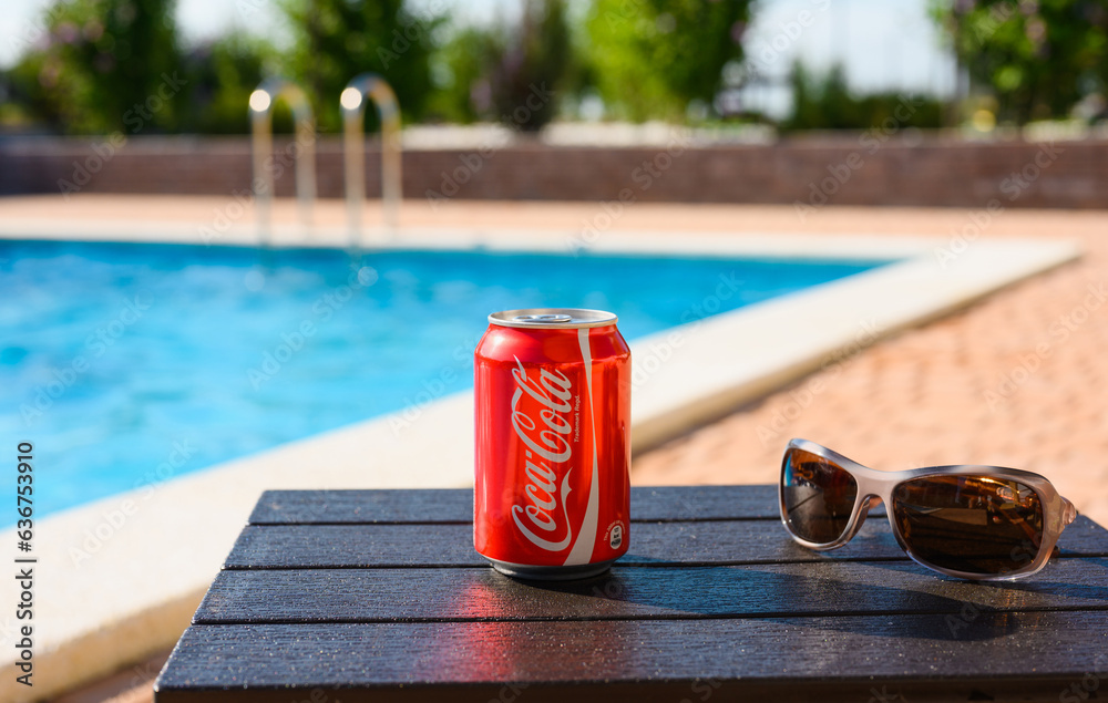 Anapa, Russia - July 18, 2023: Relaxing by the pool with Coca-Cola soft ...
