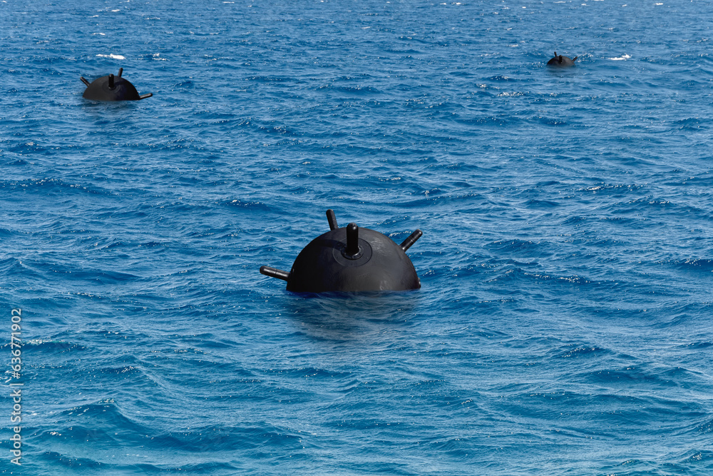 Military sea mines in the sea, MINE FENCE, anti-ship mines. Concept ...