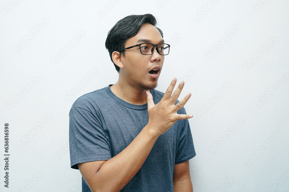 Portrait of Indonesian Asian man showing mother sign language for ...