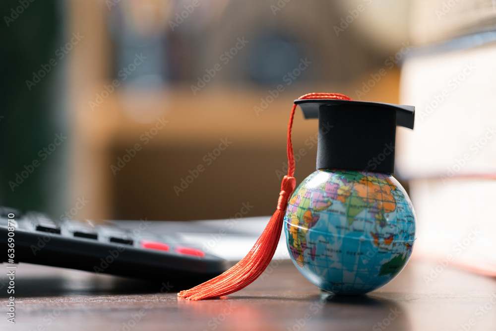 Graduation cap with Earth globe. Concept of global business study ...