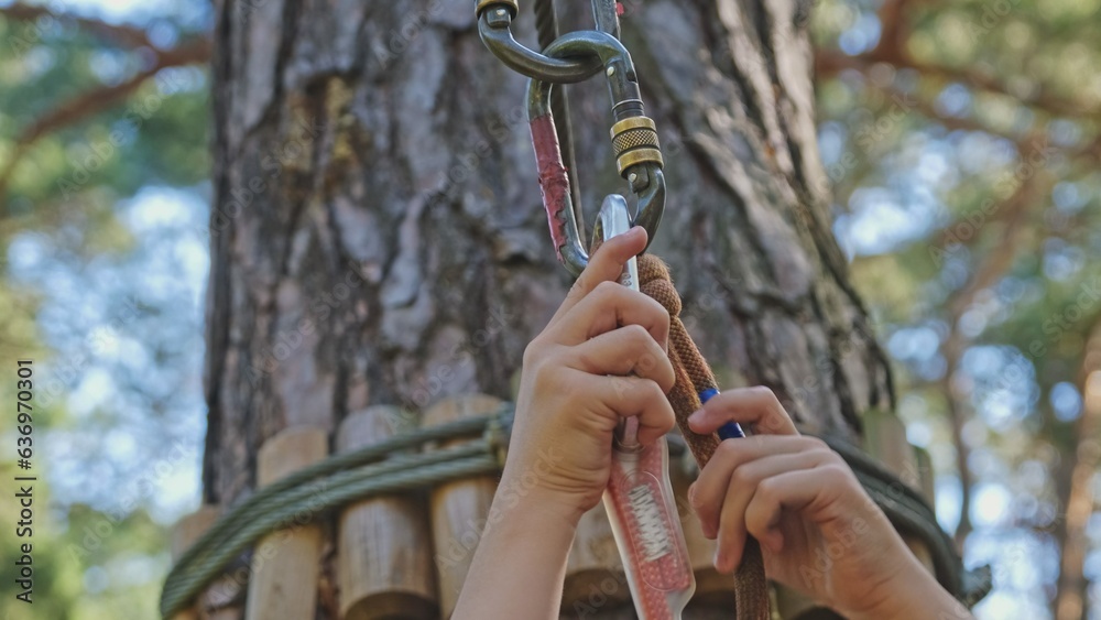 Caucasian Child Girl Attaching Double Spring Loaded Carabiner Snap Hook ...