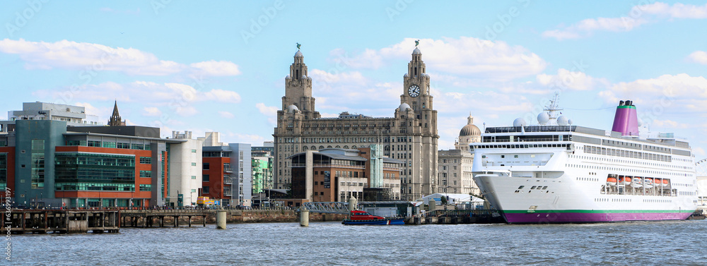 Panoramic skyline shot of Liverpool Pier Head waterfront with a big ...