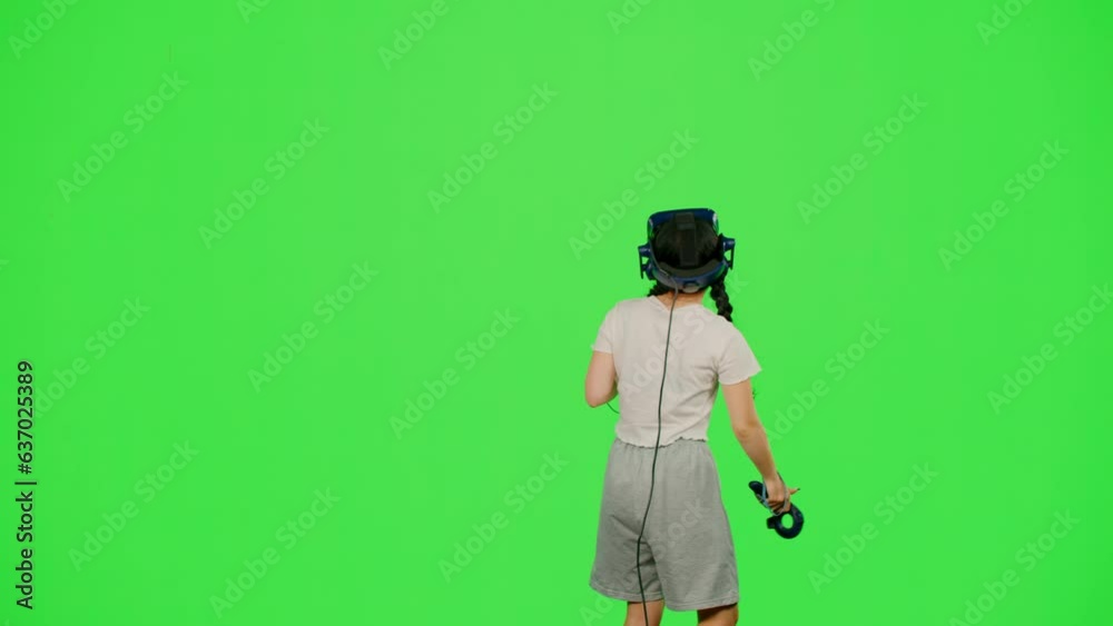 Child in cyberspace get immersive experience on chroma key green screen ...