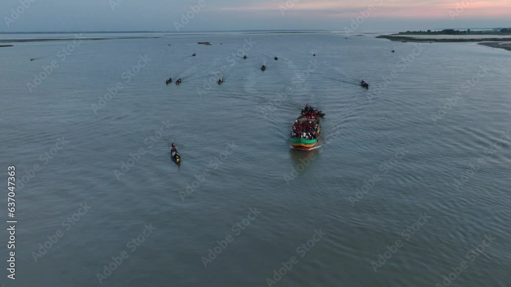 The aerial shot of boats crossing the Jamuna River in Bangladesh is a ...