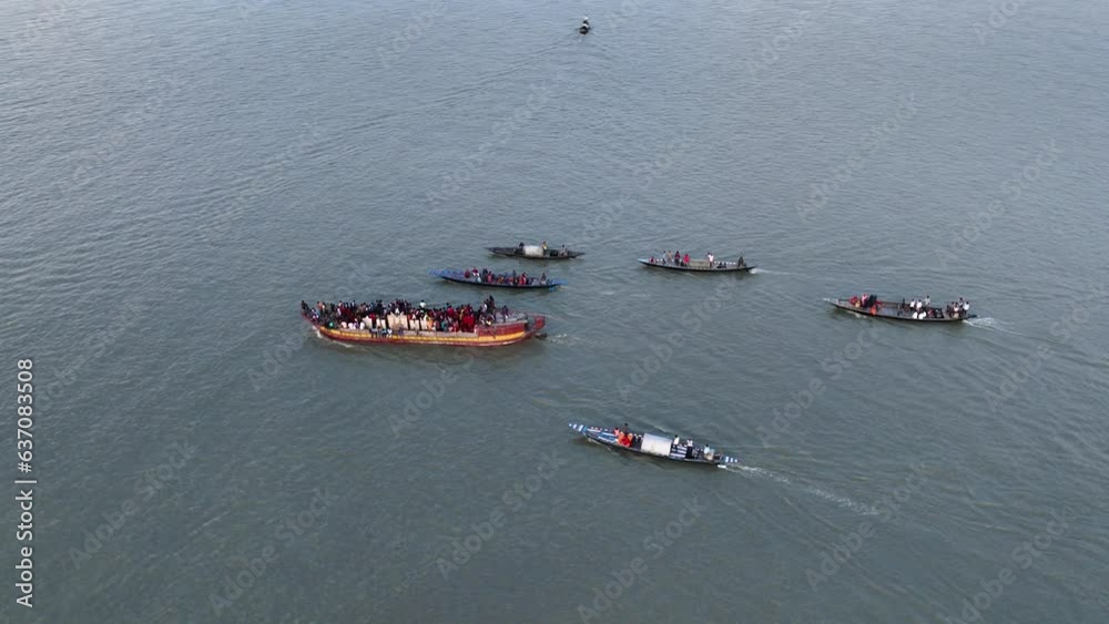 The aerial shot of boats crossing the Jamuna River in Bangladesh is a ...