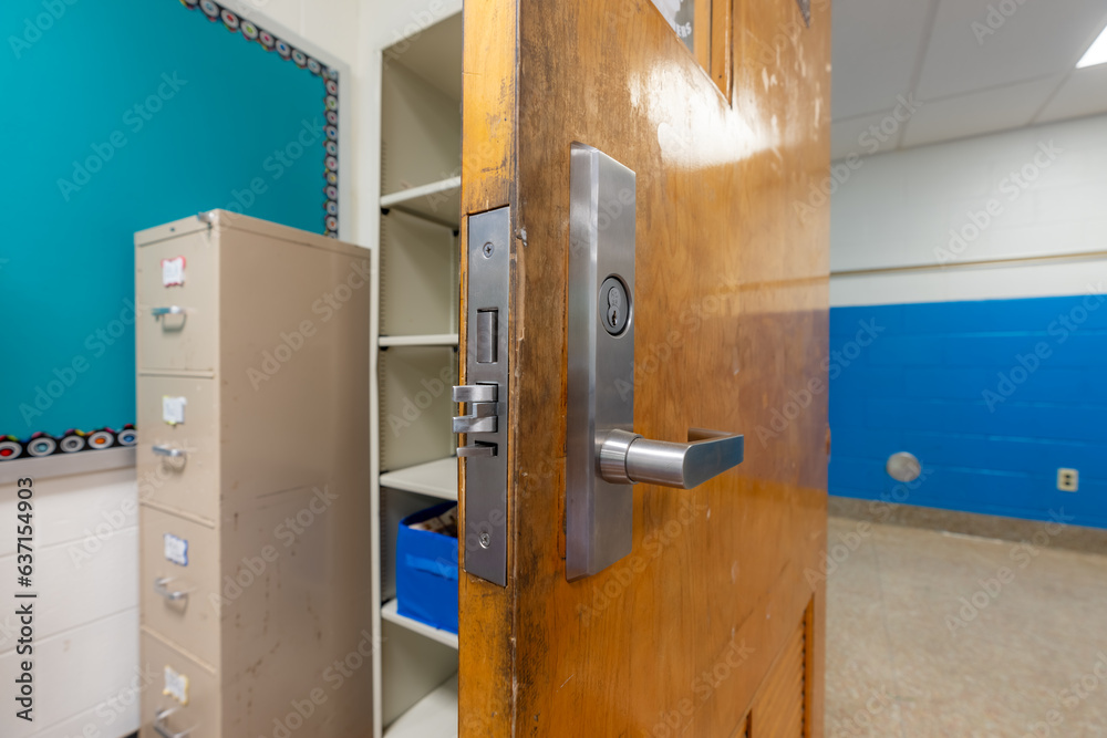 Open classroom door with new door hardware with security locks for a ...