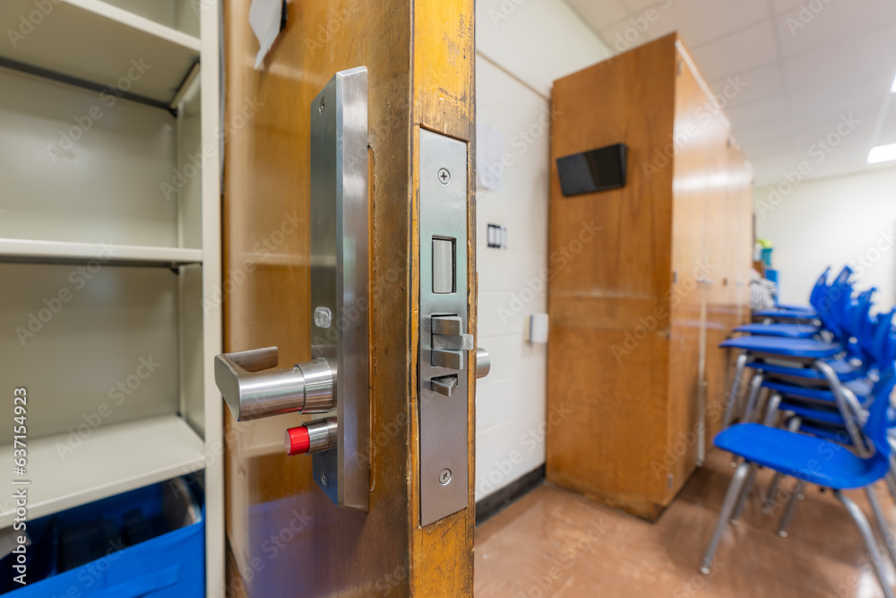 Open classroom door with new door hardware with security locks for a ...