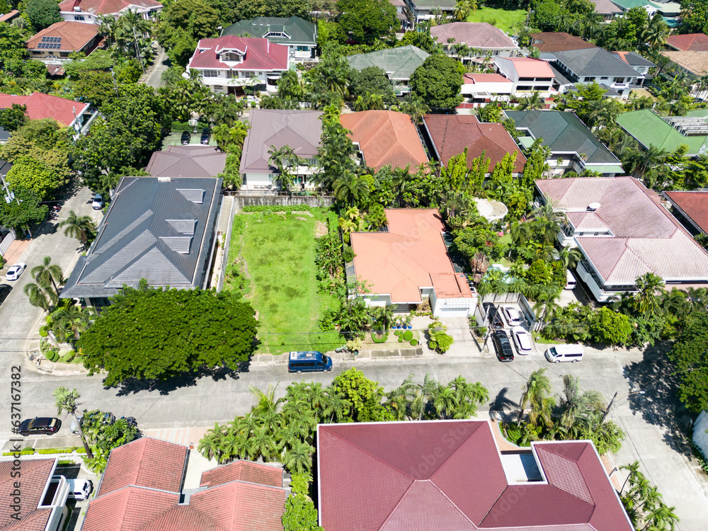 An aerial shot of a residential village in Manila, Philippines with ...