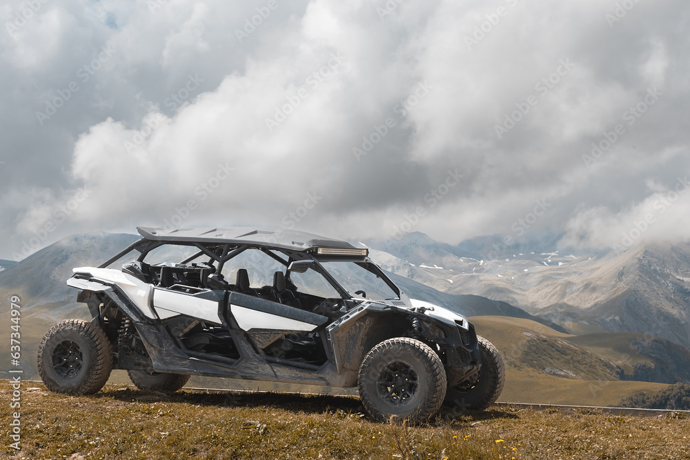 offroad utv side by side buggy in a mountains Stock Photo | Adobe Stock