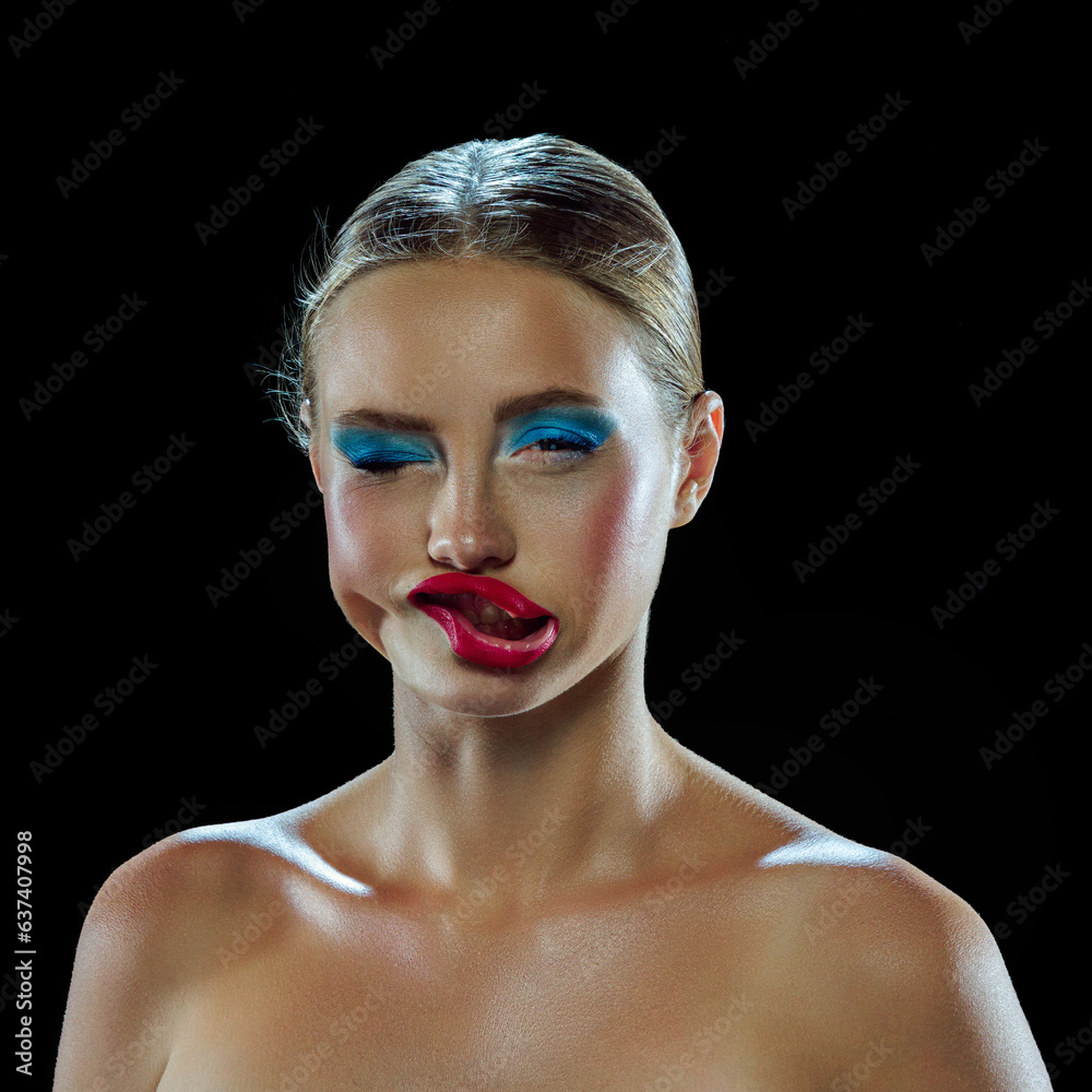 Strong wind blowing on beautiful girl's face with bright colorful make ...