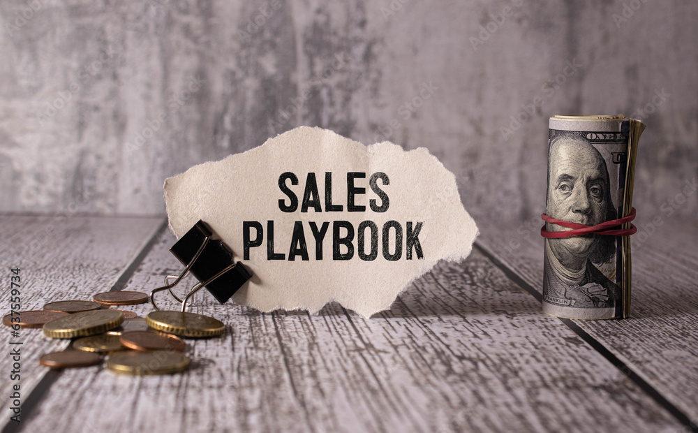sales playbook text on paper on the chart background with pen Stock ...