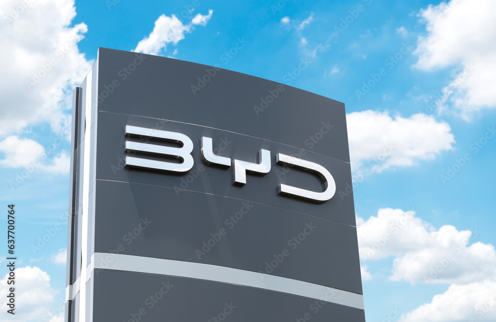 Pole billboard with logo BYD on blue sky background Stock Photo | Adobe ...