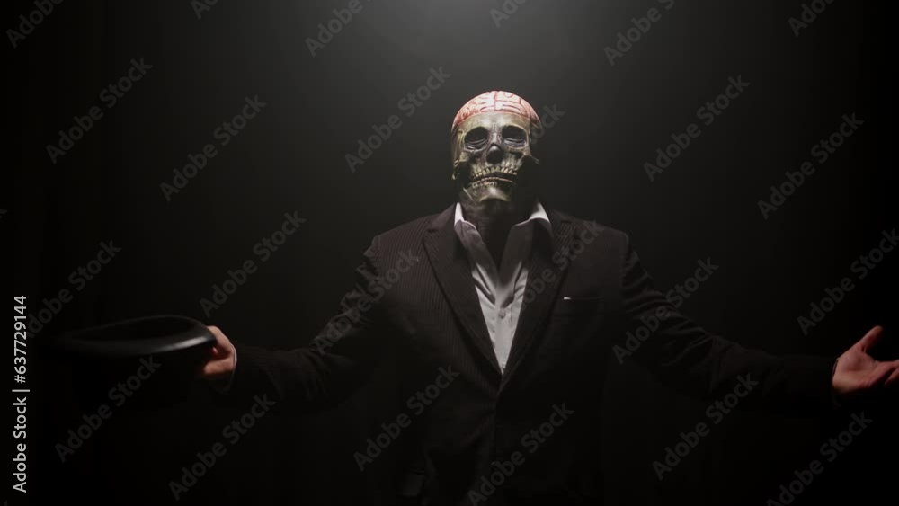 Vídeo Do Stock Terrible Skeleton In Black Jacket Bends Down Takes Off