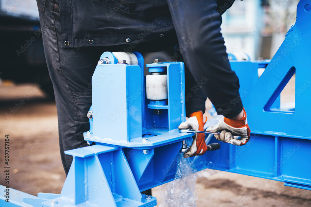 Manual worker working at shipyard construction site Stock Photo | Adobe ...