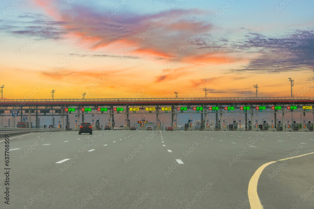 View gate for cars at the entrance to the toll road, limited by the ...