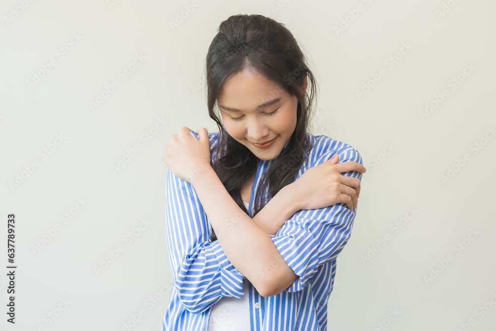 Smiling positive, hug self care happy asian young woman hands hugging ...