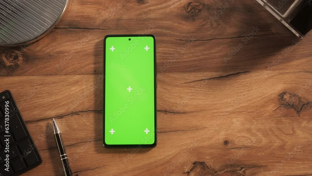 Top View of a Smartphone with Mock Up Green Screen Display. Static ...