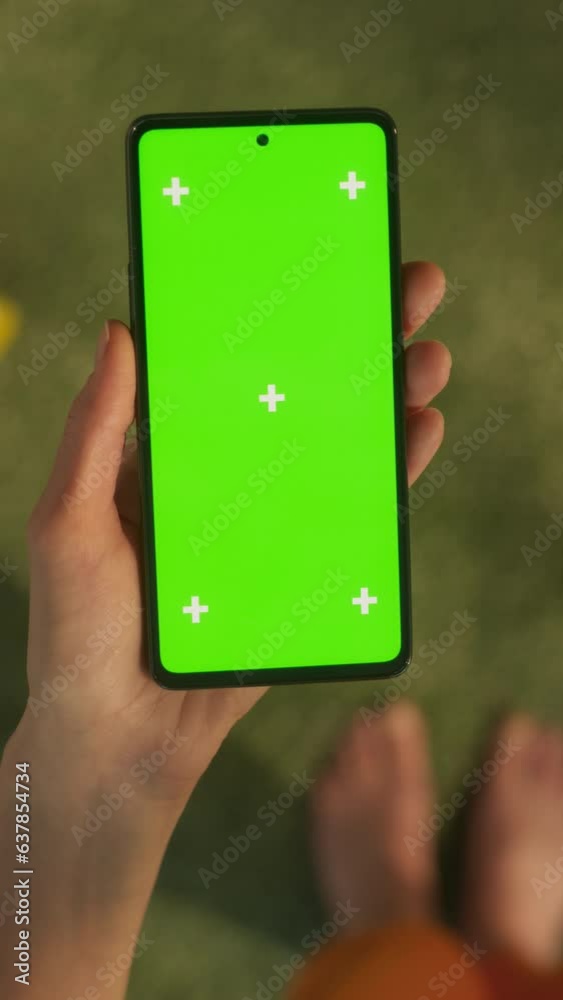 Vertical Screen: Anonymous Woman In Tennis Field Using a Smartphone ...