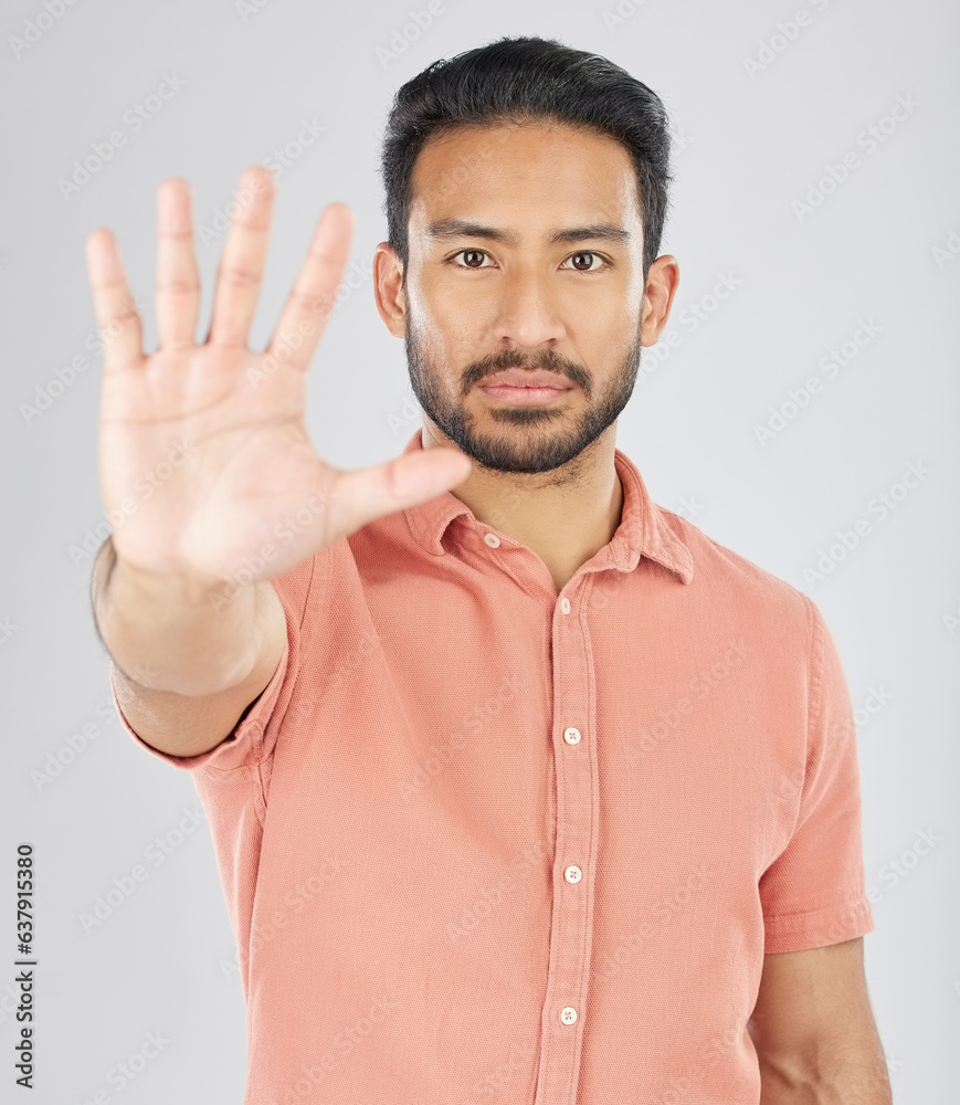 Stop, hand and portrait of asian man in studio with warning, control or ...