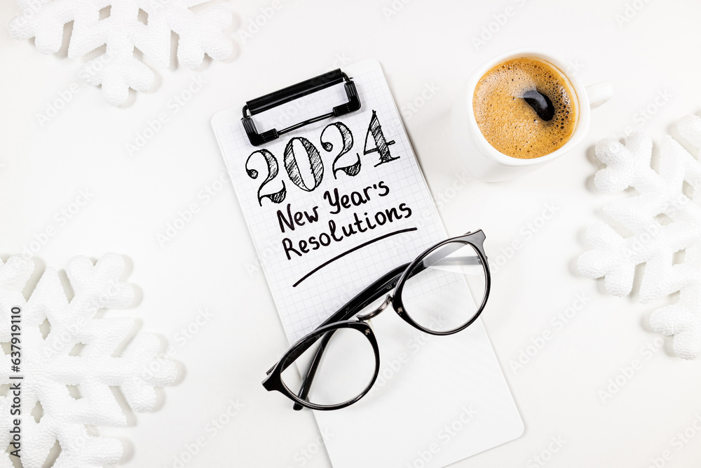New year resolutions 2024 on desk. 2024 goals list with notebook ...
