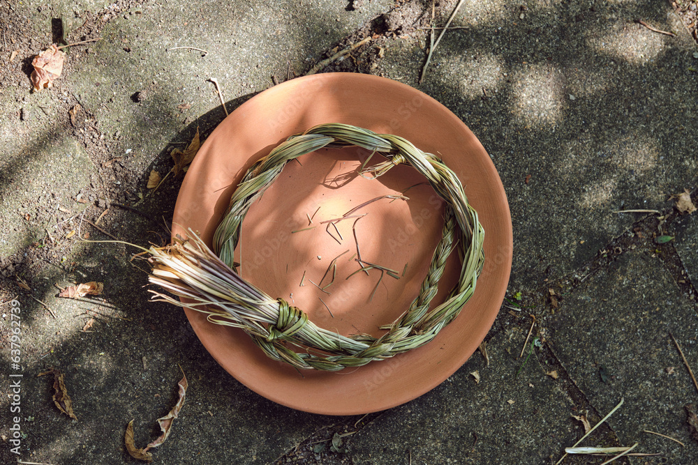 Sweetgrass braid (Hierochloe odorata), also called vanilla grass, on a ...
