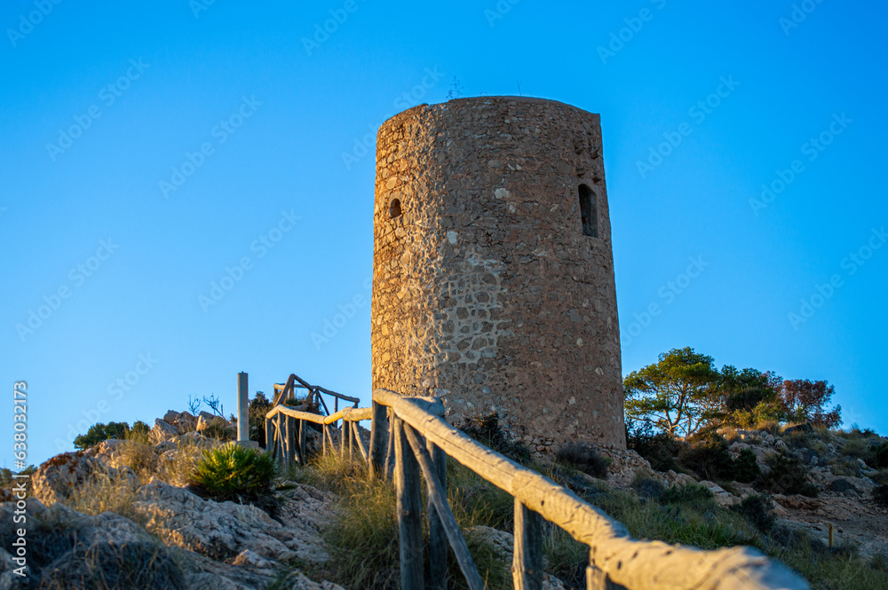 Mediterranean coastal landscape. Historic Torre Vigia De Cerro Gordo, a ...