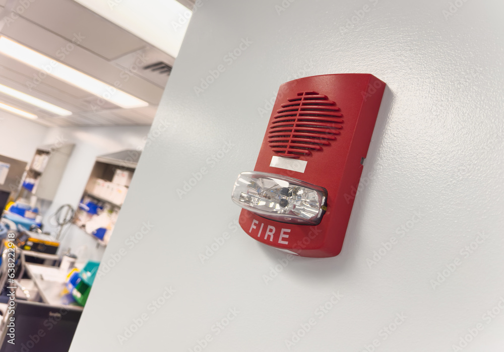 Vivid fire alarm, a symbol of urgency and safety, warns of danger ...