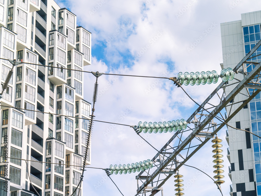 Glass insulators are installed on the power lines. Electrical ...