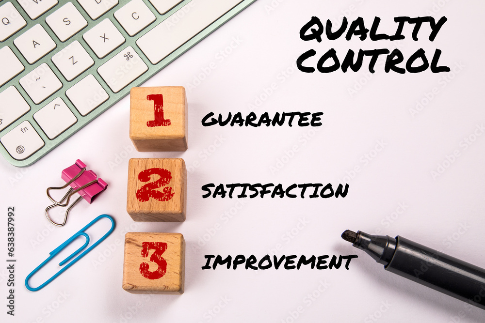 Quality Control Concept. Computer keyboard on a white office table ...