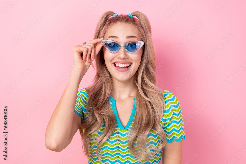 Portrait of impressed girl with tails dressed colorful suit touching ...