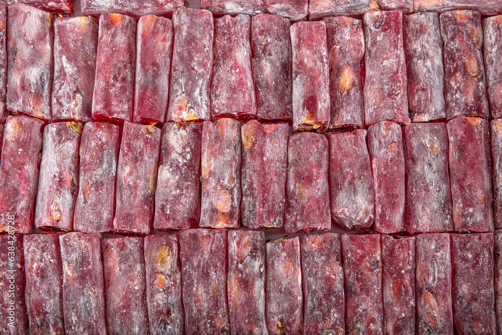 Sweet roll with pomegranate and nuts, turkish sweets. Mix of various ...