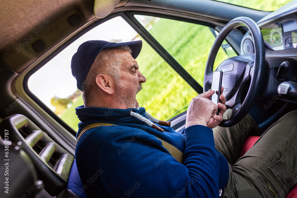 Exhausted truck driver yawning in his van. Tiredness and sleeping ...