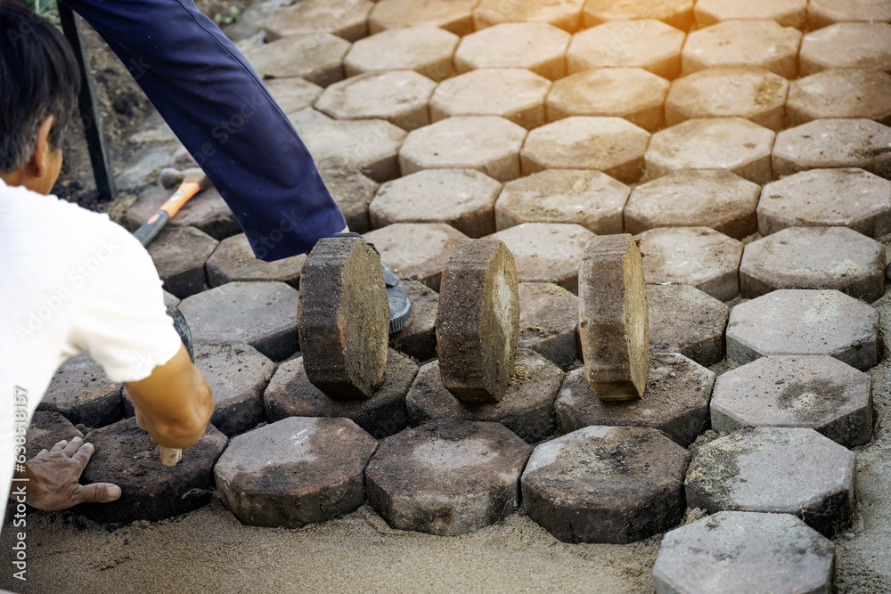 Construction site of pavement octagon bricks road. Installation or ...
