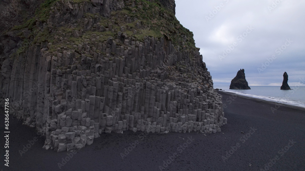 The Reynisfjara Black sand beach, Halsanefshellir cave, basalt columns ...