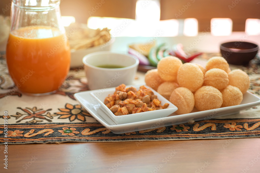 Pani puri famous Indian tradition food, Pani puri snack on white plate ...