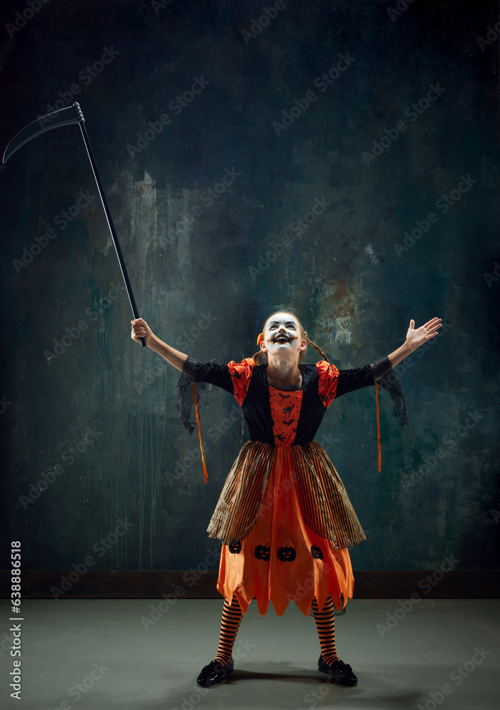 Creepy laugh. Little girl, child in makeup and costume for halloween ...