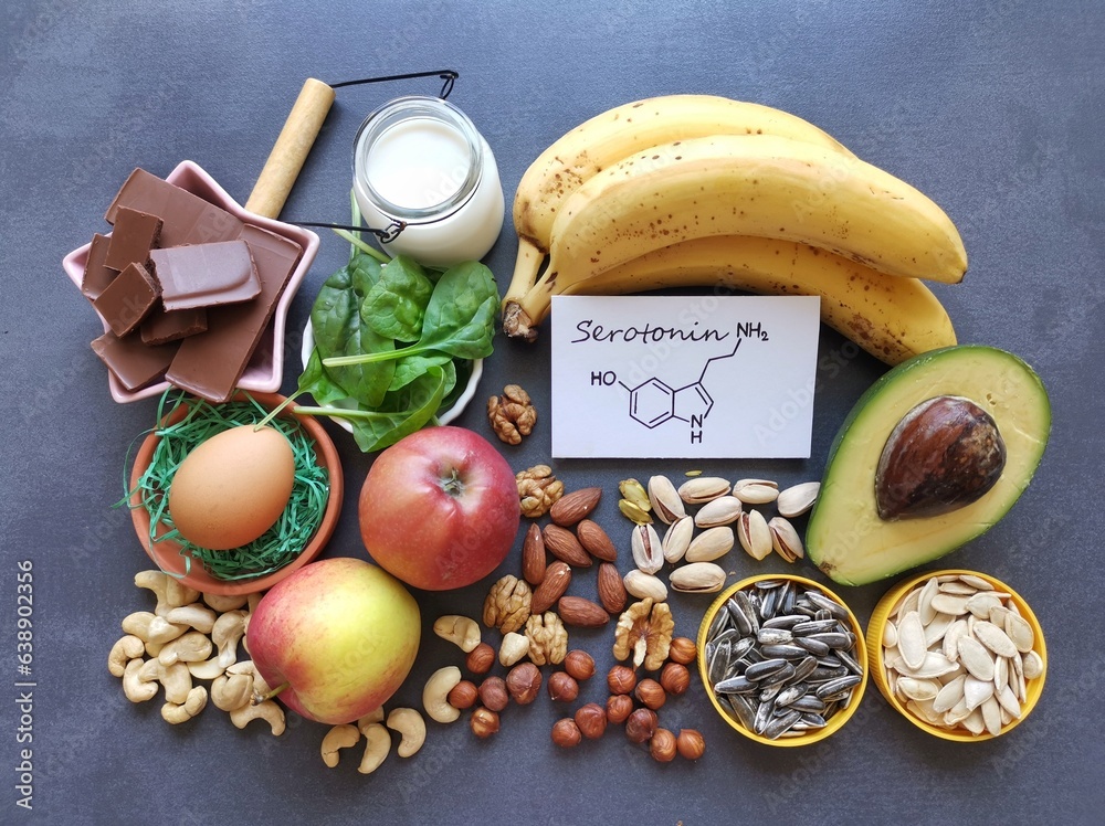 Serotonin-boosting foods. Assortment of food for good mood and ...