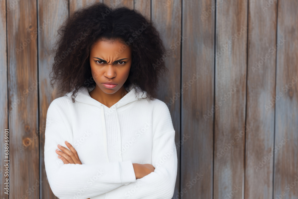 Anger African Woman In White Sweatshirt On Wooden Plank Background ...