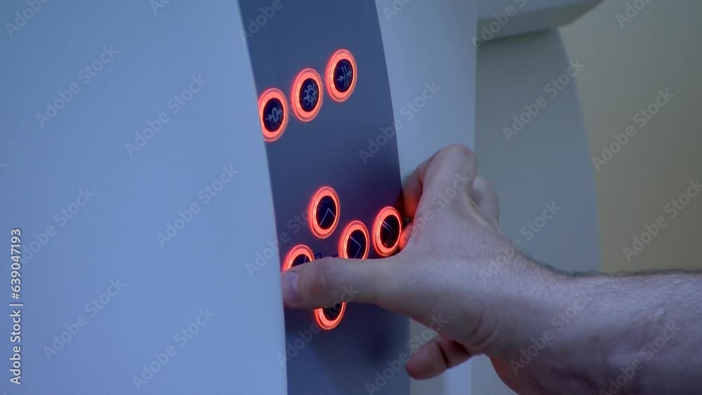 The hand of a male nurse seen in this video pushing the buttons of an ...